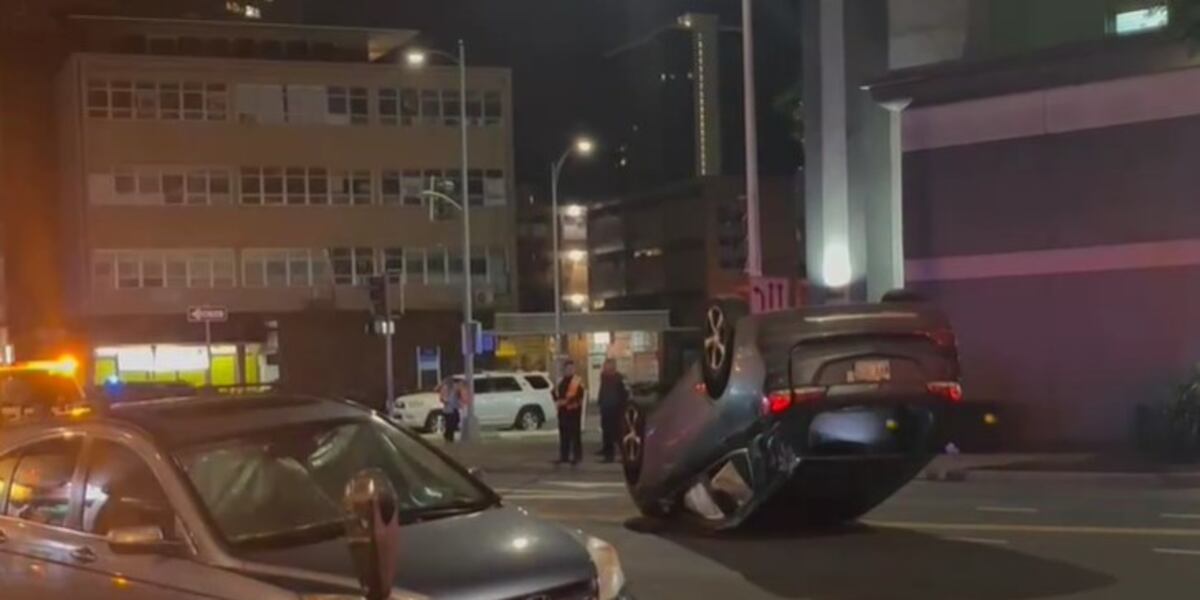 Driver Extricated From Car Following Rollover Crash Near Ala Moana
